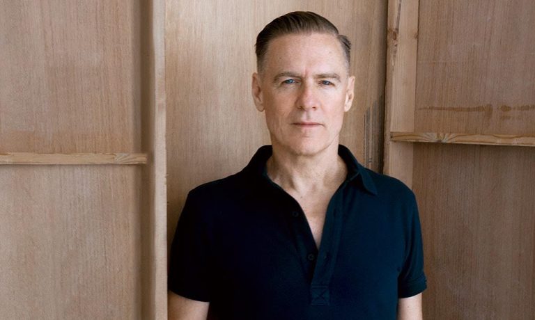 Watch Bryan Adams' New Lyric Video For 'Must Be Santa' | uDiscover