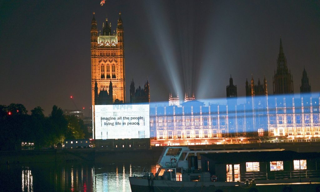 John Lennon Lyrics From ‘Imagine’ Projected Onto Landmarks