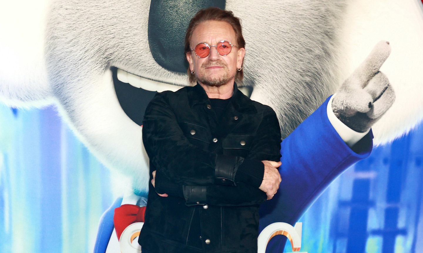 Bono Sings ‘Running To Stand Still’ At Dublin Busking Benefit