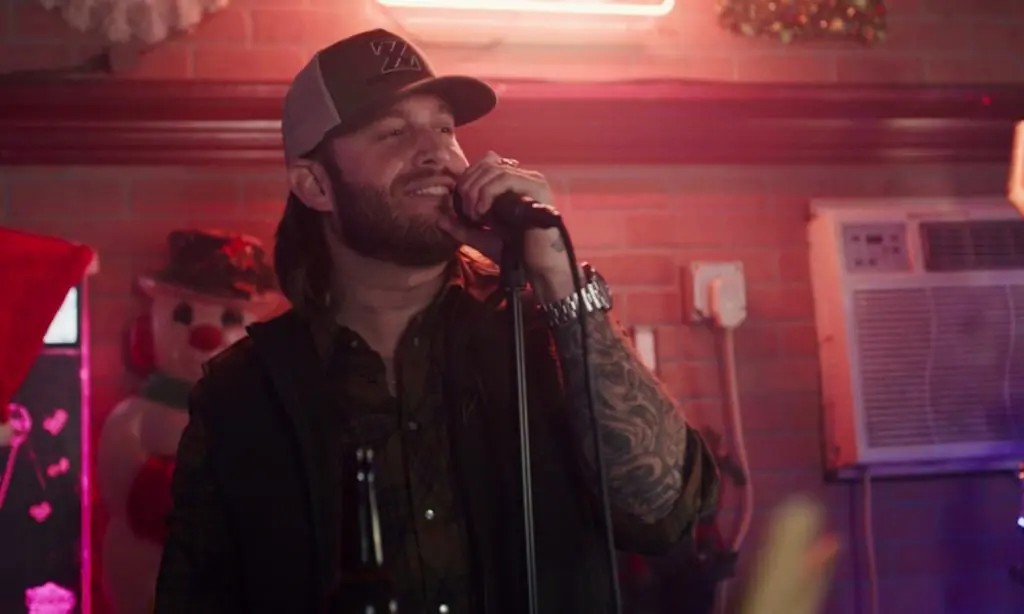 See Jon Langston At Santa’s Pub In ‘I Only Want You For Christmas’ Video