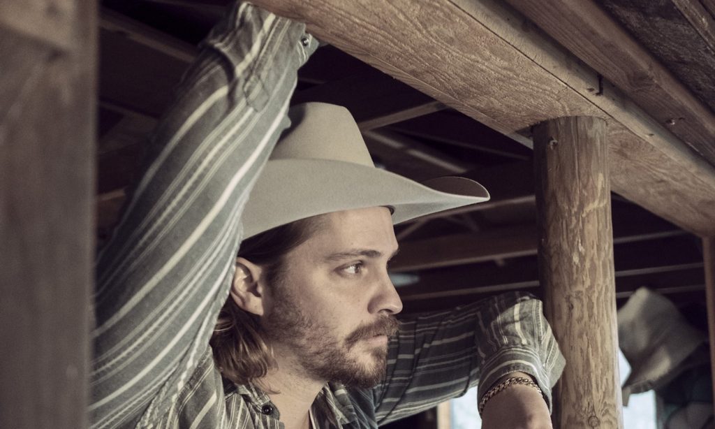 ‘Yellowstone’ Star Luke Grimes Shares Country Debut ‘No Horse To Ride’